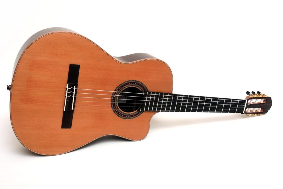Small Classical Guitar with Cutaway and Pickup for Modern Playing Styles
