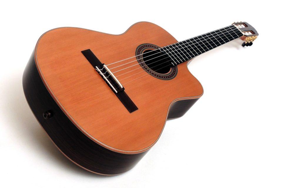 Small Classical Guitar with Cutaway and Pickup for Modern Playing Styles