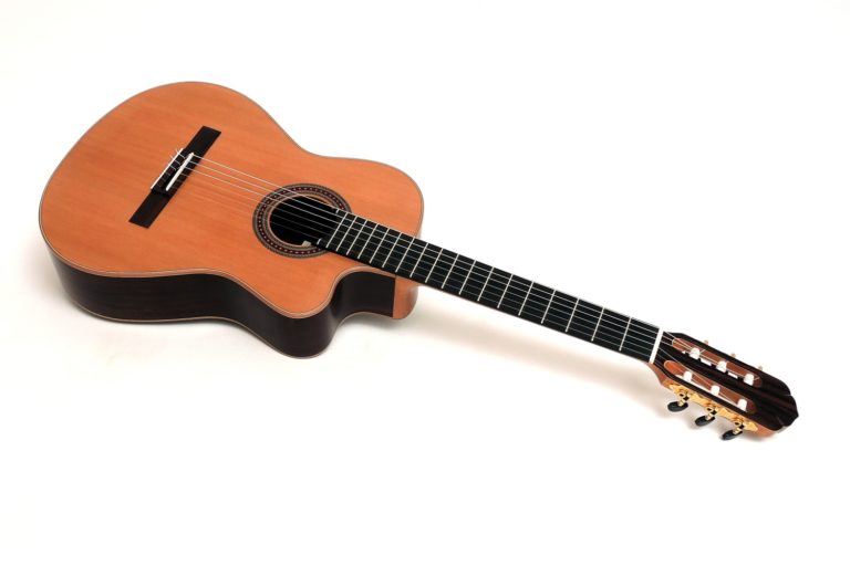 Small Classical Guitar with Cutaway and Pickup for Modern Playing Styles